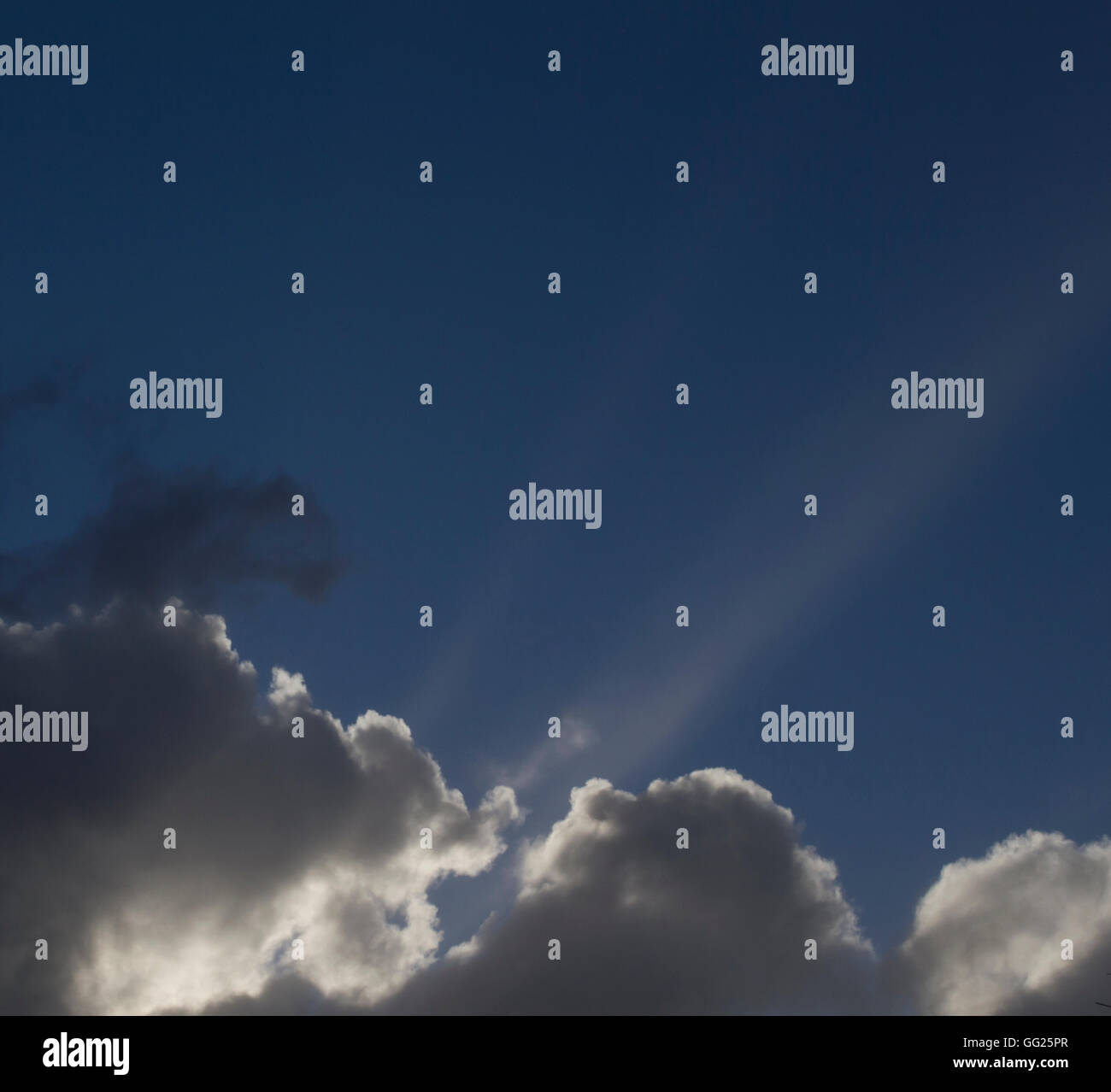 Rays of the sun coming from behind the clouds Stock Photo - Alamy