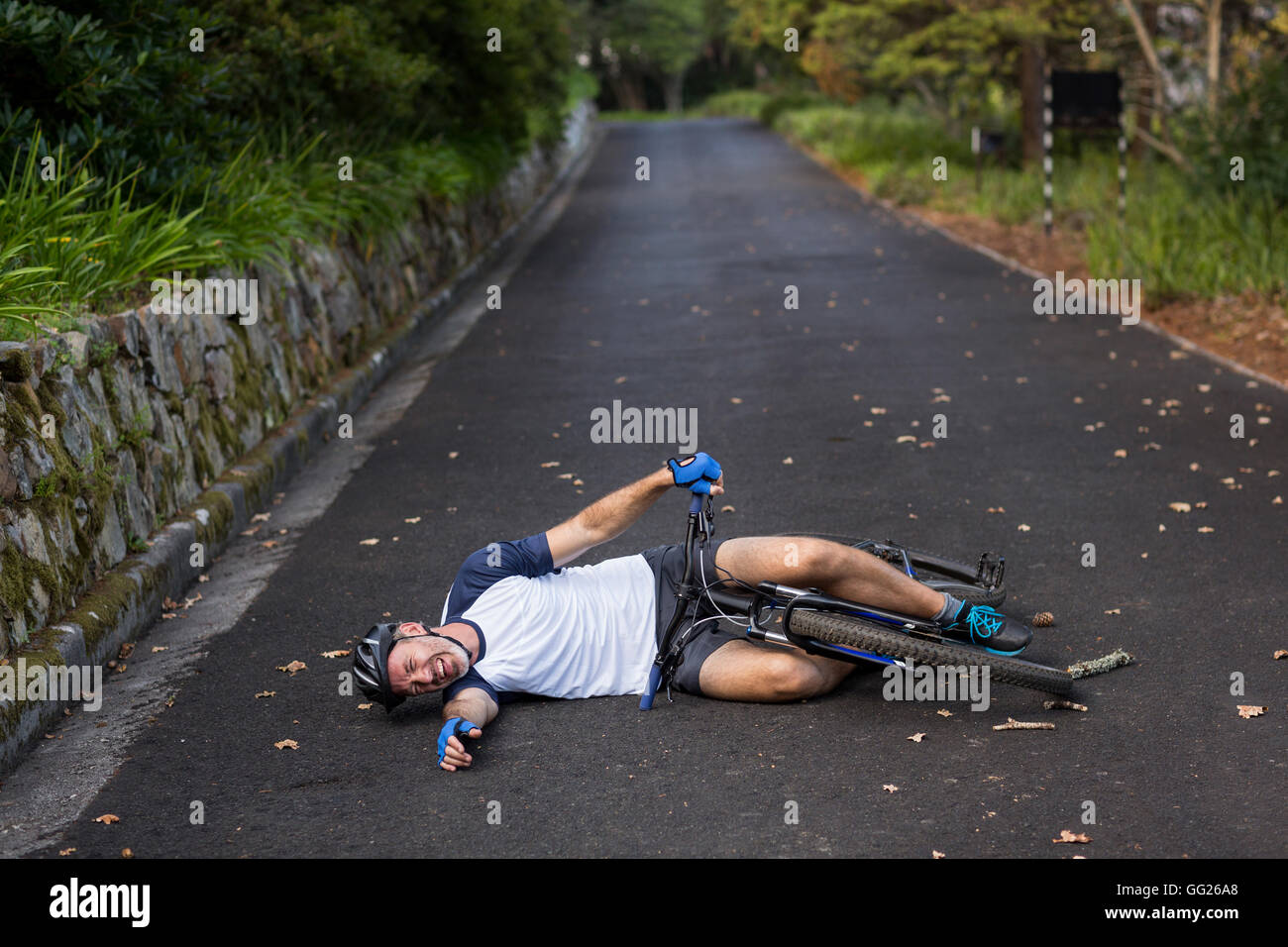 Cyclist fallen from bike hi-res stock photography and images - Alamy