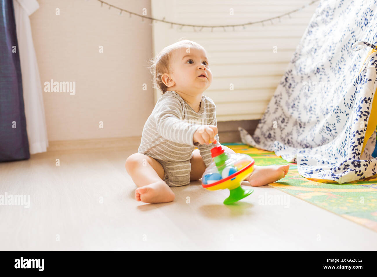 funny boy kid playing with toy Stock Photo - Alamy