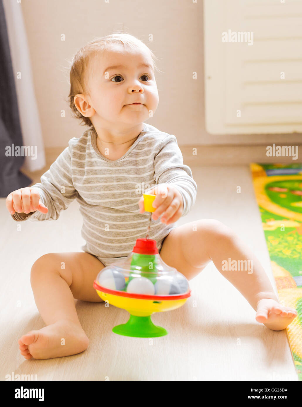 funny boy kid playing with toy Stock Photo - Alamy