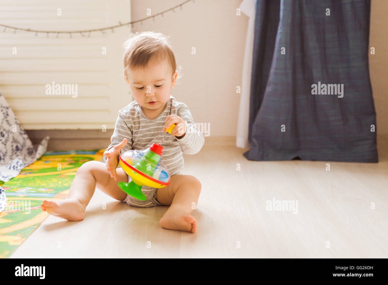 funny boy kid playing with toy Stock Photo - Alamy