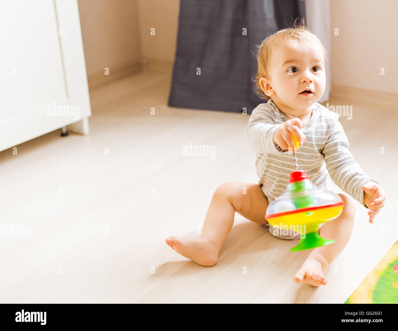 funny boy kid playing with toy Stock Photo - Alamy