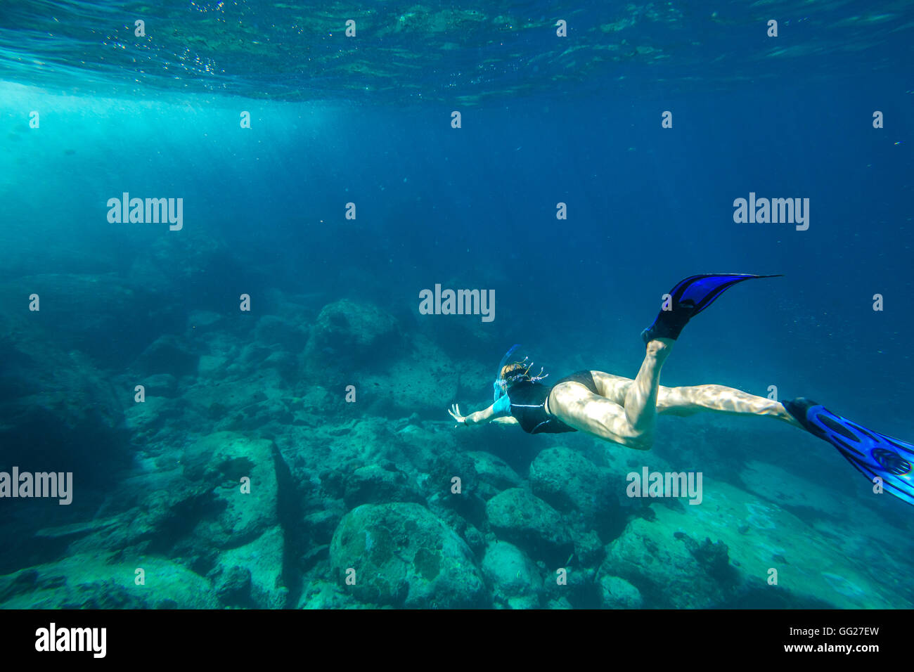Woman scuba diving tropical fish hi-res stock photography and images ...