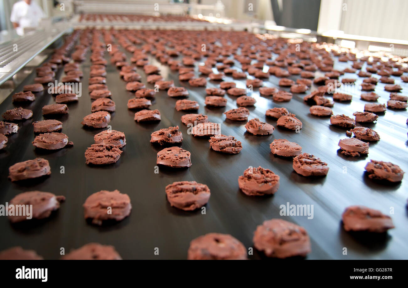 Production line of baking chocolate cookies Stock Photo - Alamy