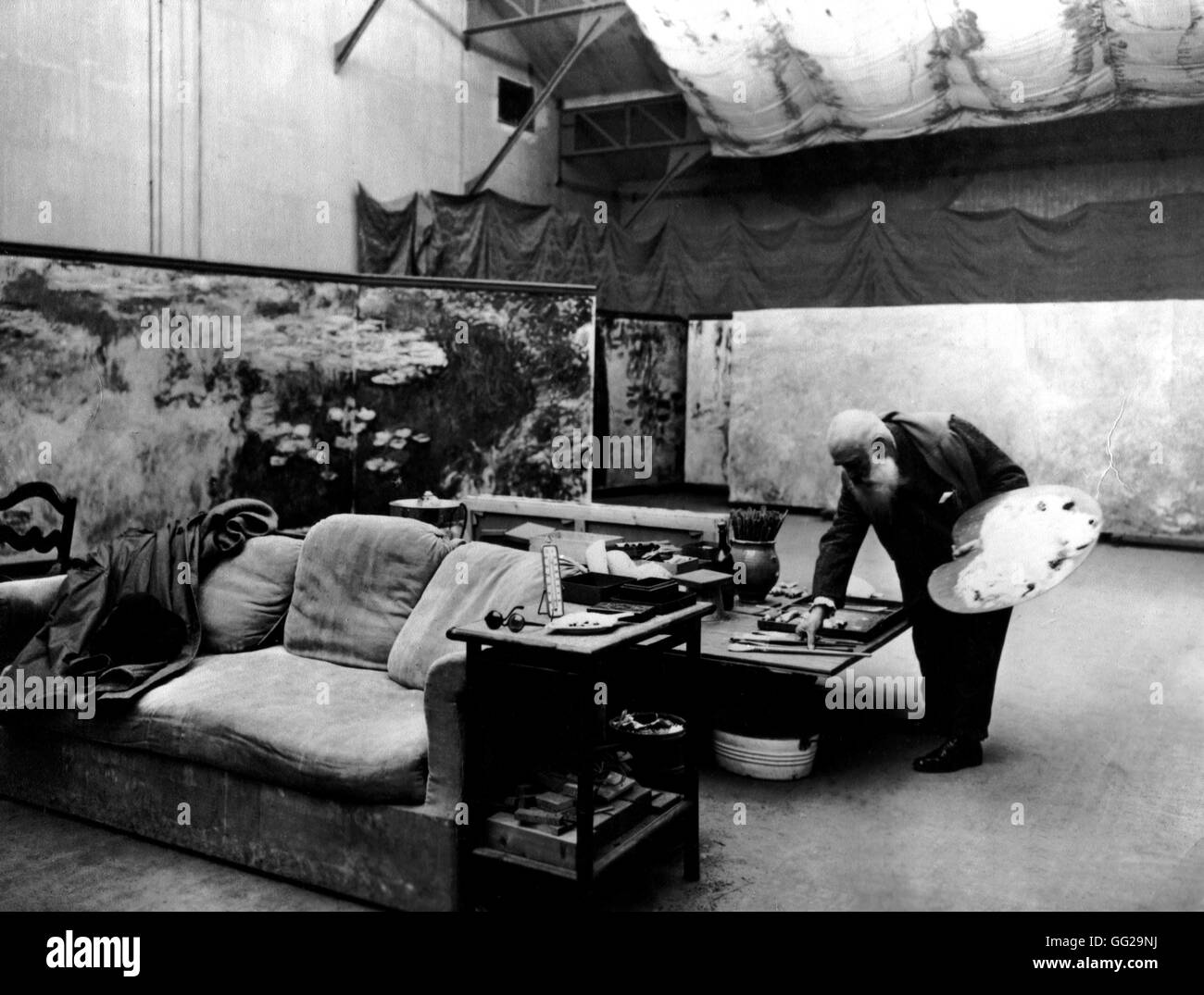 Painter Claude Monet in his studio at Giverny ca 1919. Paris, Musée ...
