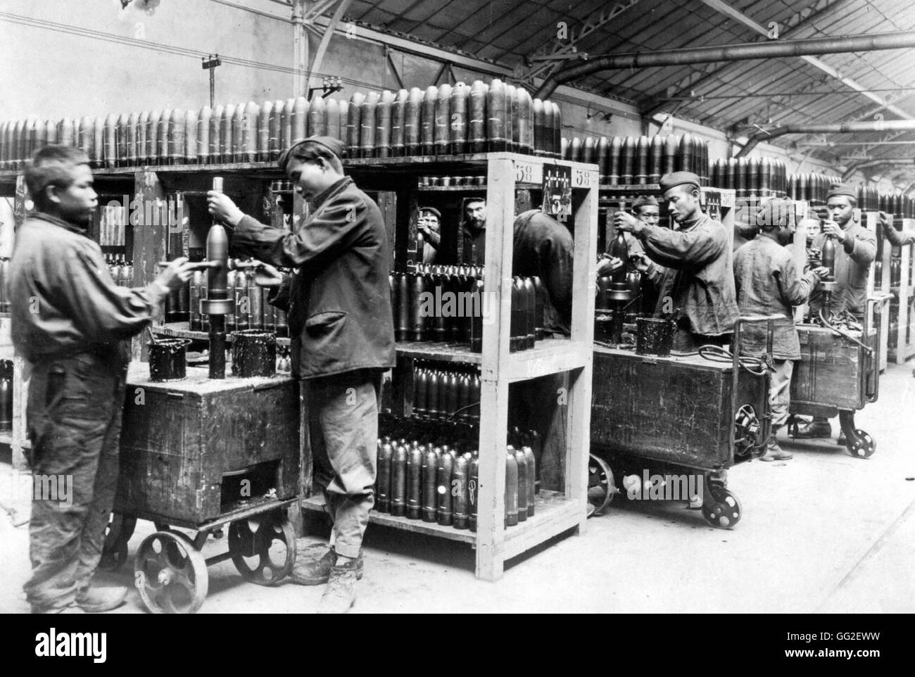 World War I. Anamites working in an armament factory: painting shells ...