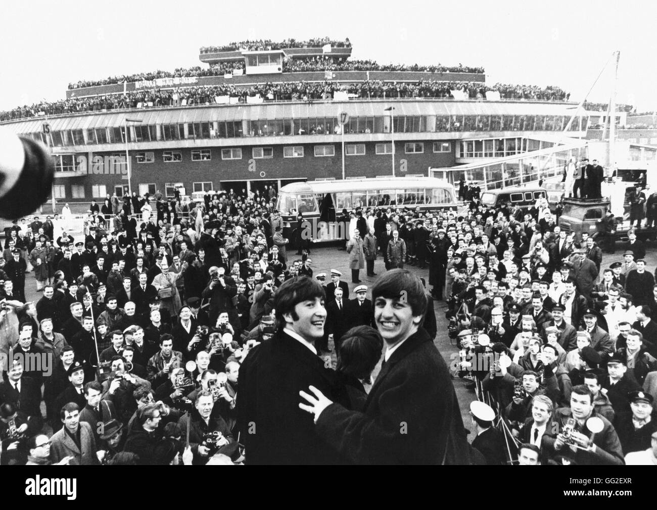 The Beatles arriving at the London Heathrow Airport, after a successful ...