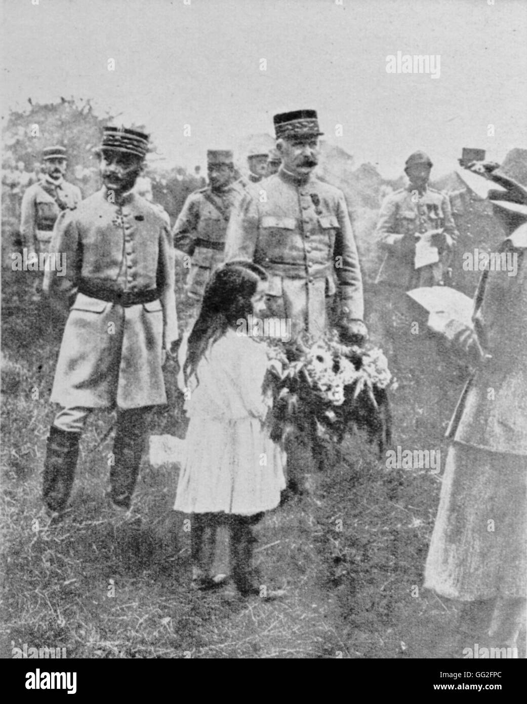 First World War. General Pétain receiving flowers from a little girl ...