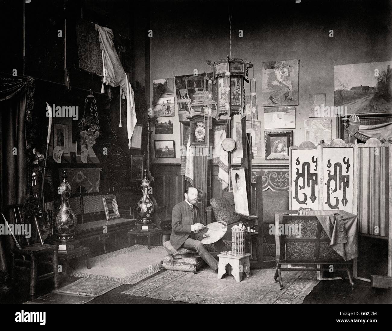 French painter and illustrator Albert Fourié in his Paris studio ...