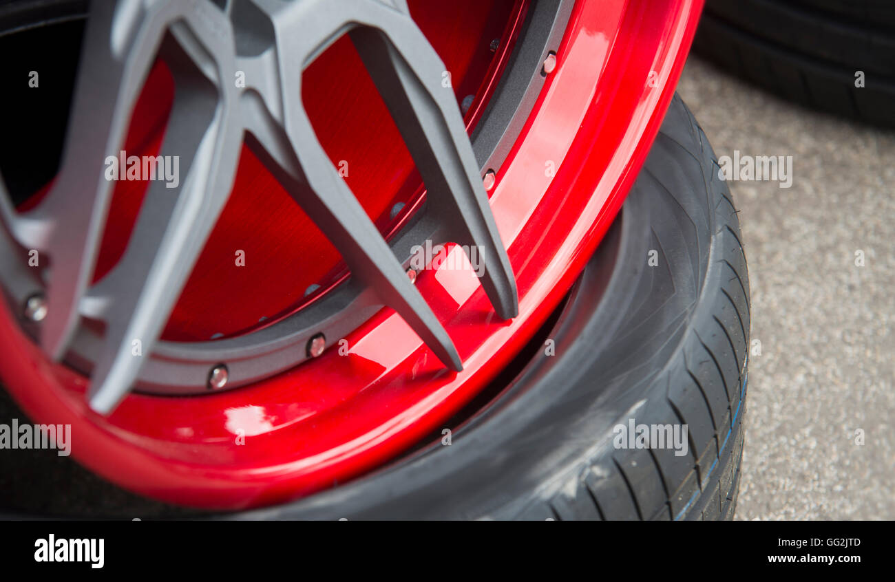Closeup detail of Red Aluminum car wheel Stock Photo - Alamy