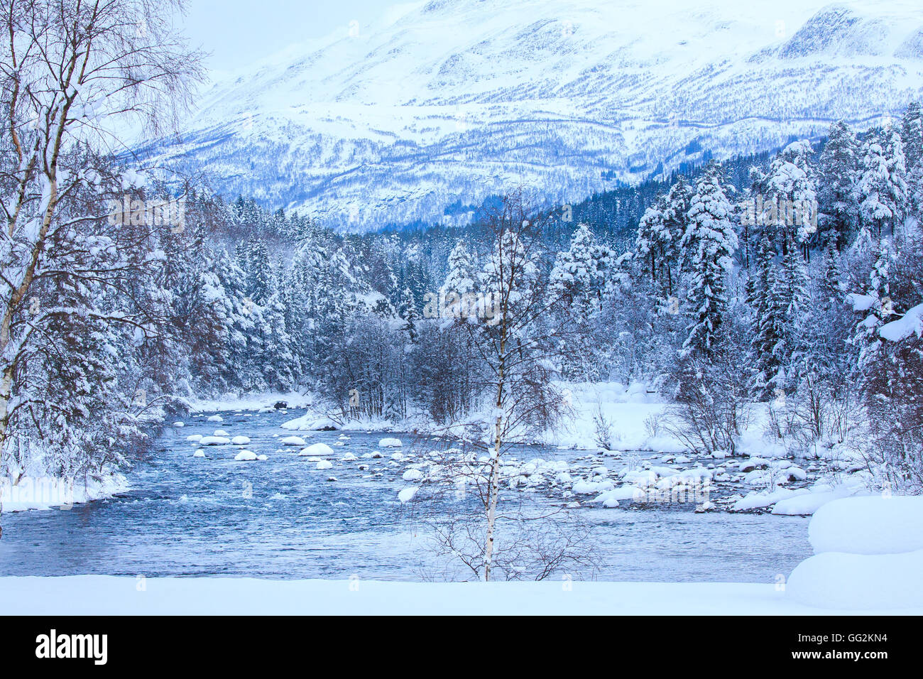 Sub-zero temperatures, but the river is not frozen. Landscape covered ...