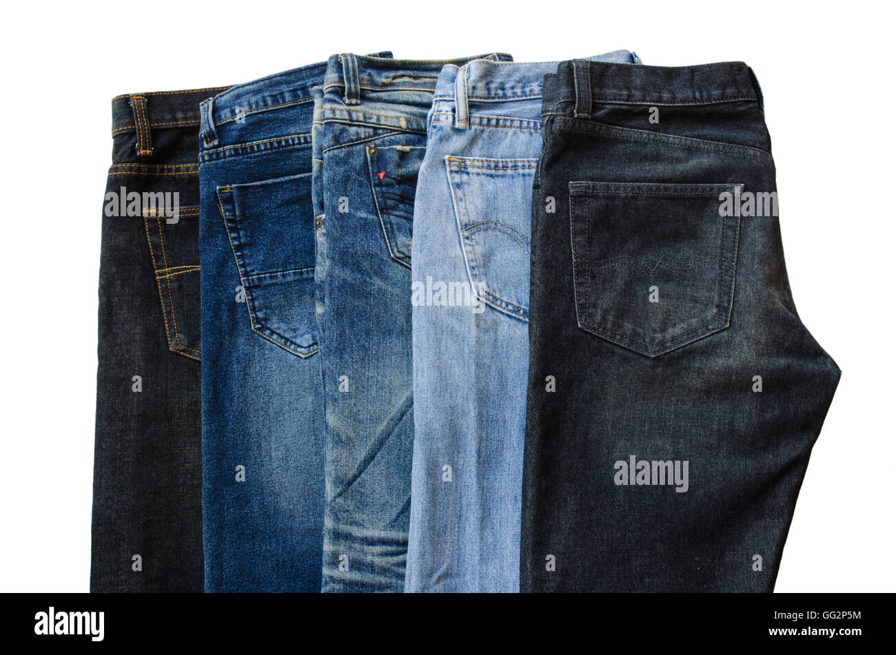 four jeans on white background Stock Photo - Alamy