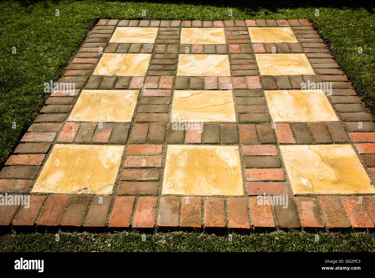 Decorative hard-standing for outdoor dining Stock Photo - Alamy