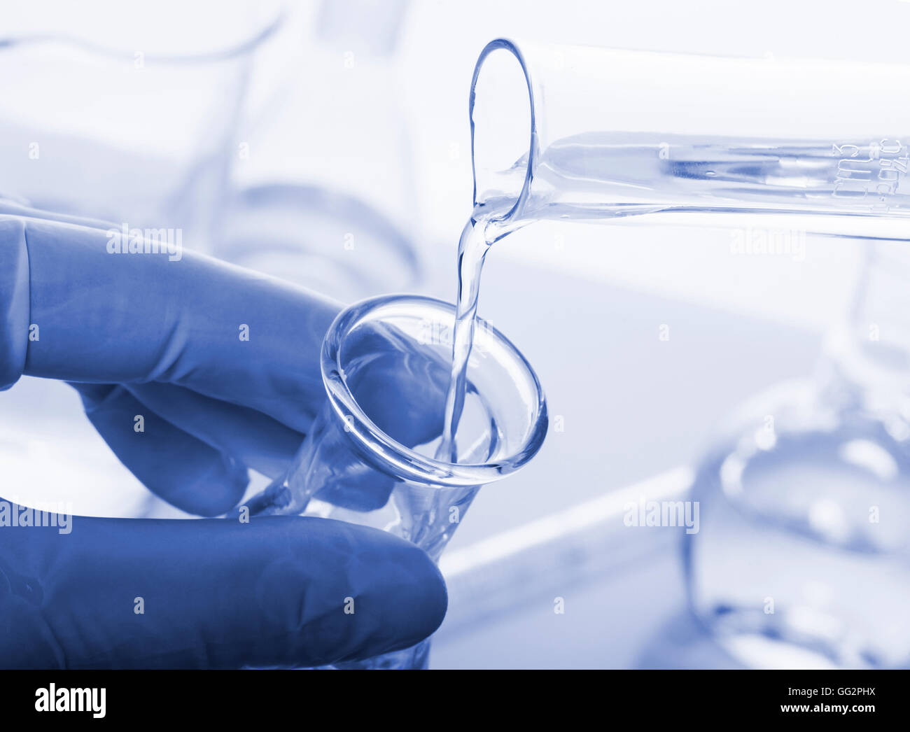 Test-tubes with reflections on a white and blue background. Laboratory ...