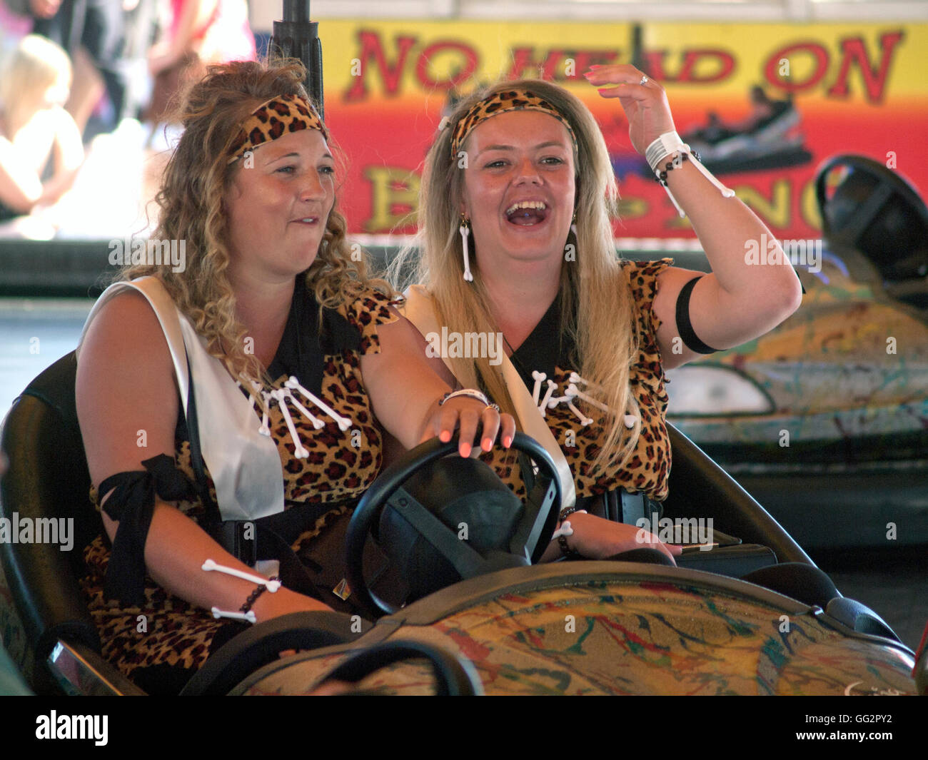 Fun in a dodgem car on Brighton Pier Stock Photo - Alamy