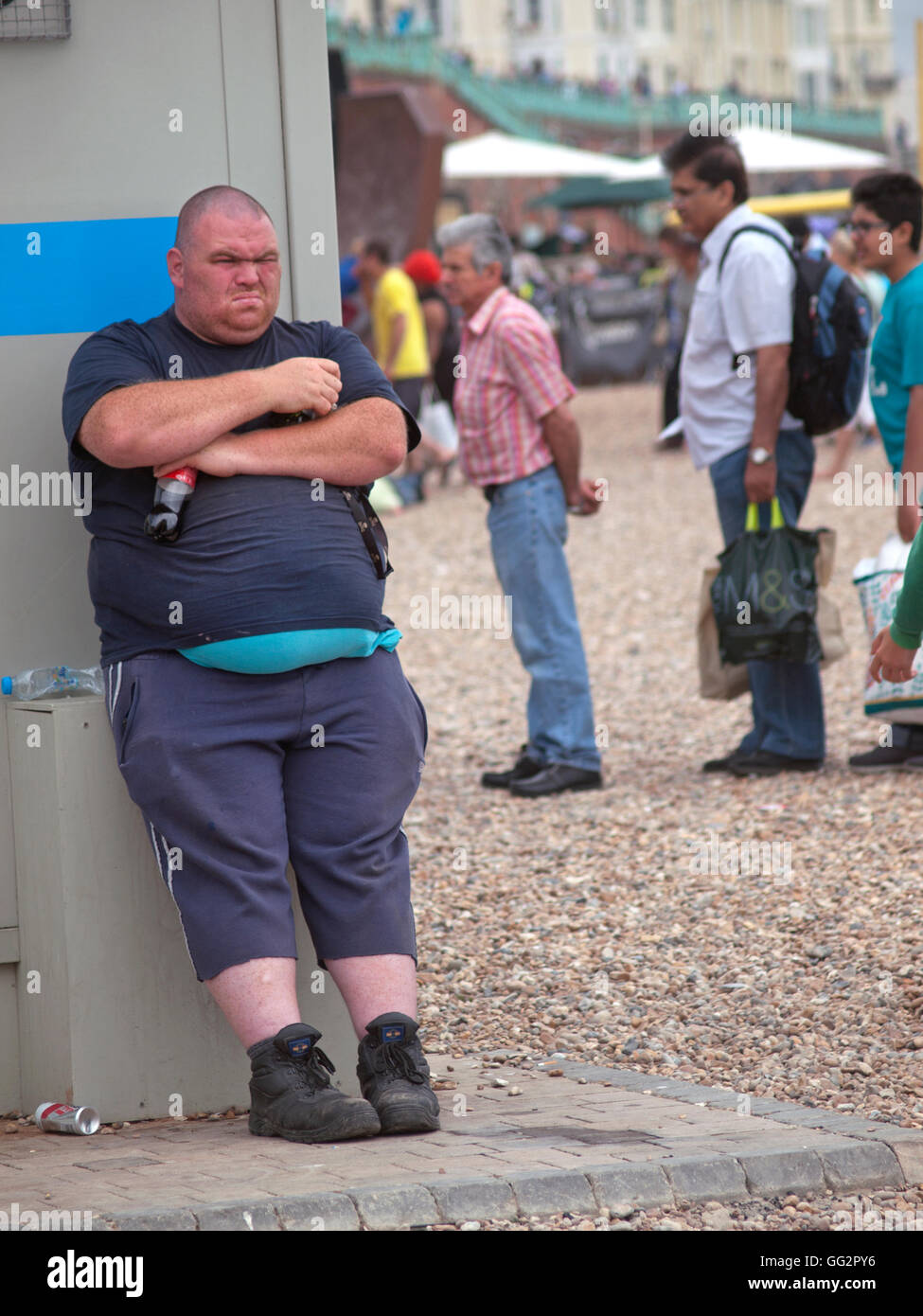 Waiting around by the beach in Brighton Stock Photo - Alamy