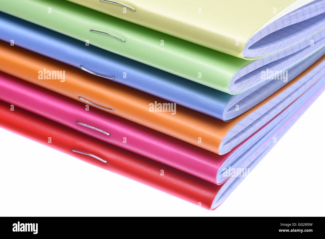 Stack of exercise books isolated on white background Stock Photo - Alamy