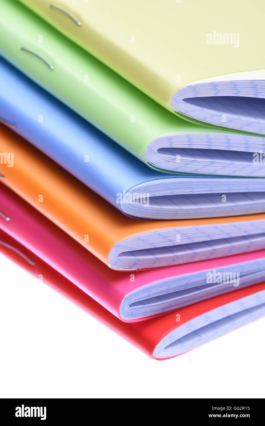 Stack of exercise books isolated on white background Stock Photo - Alamy
