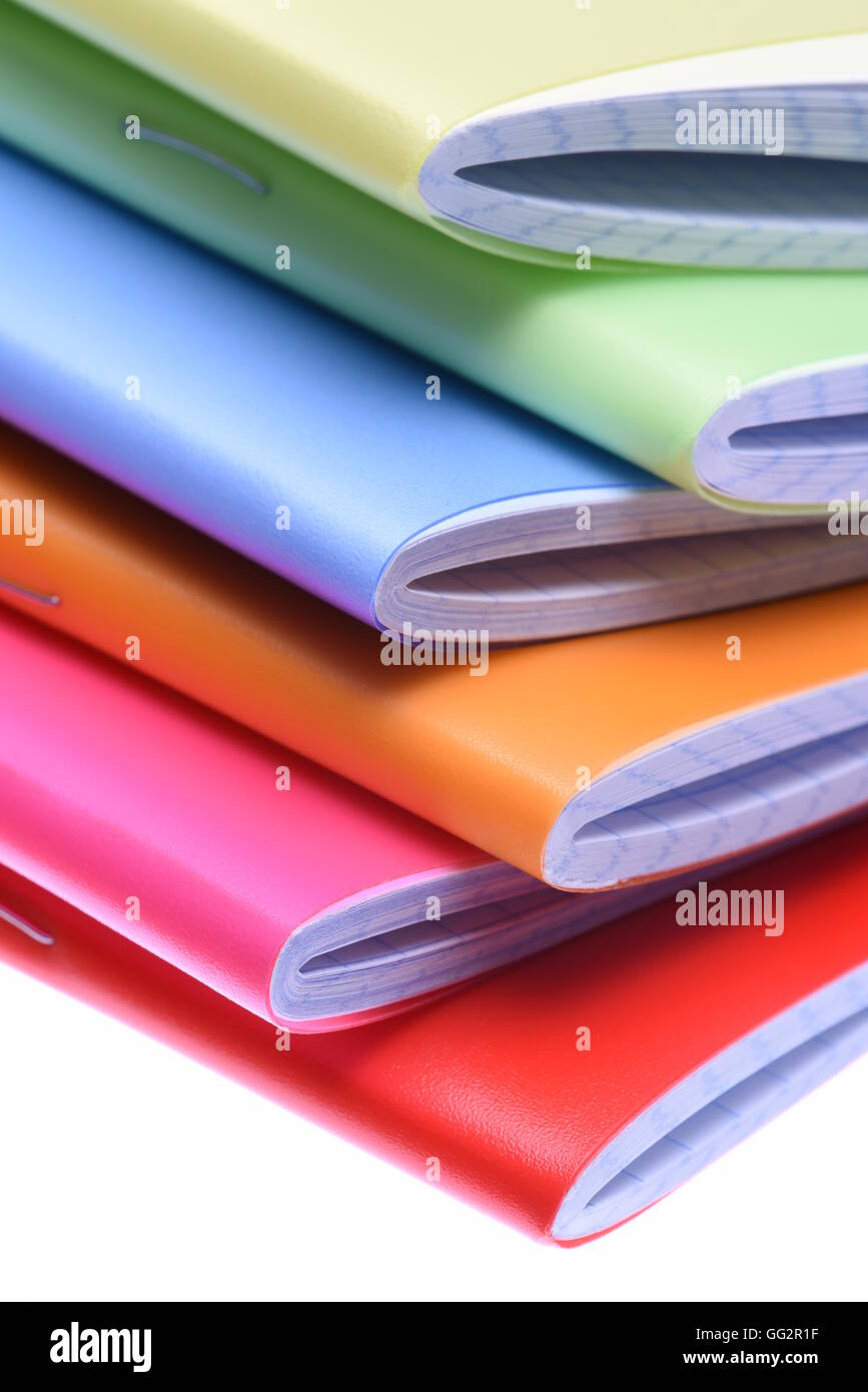 Stack of exercise books isolated on white background Stock Photo - Alamy
