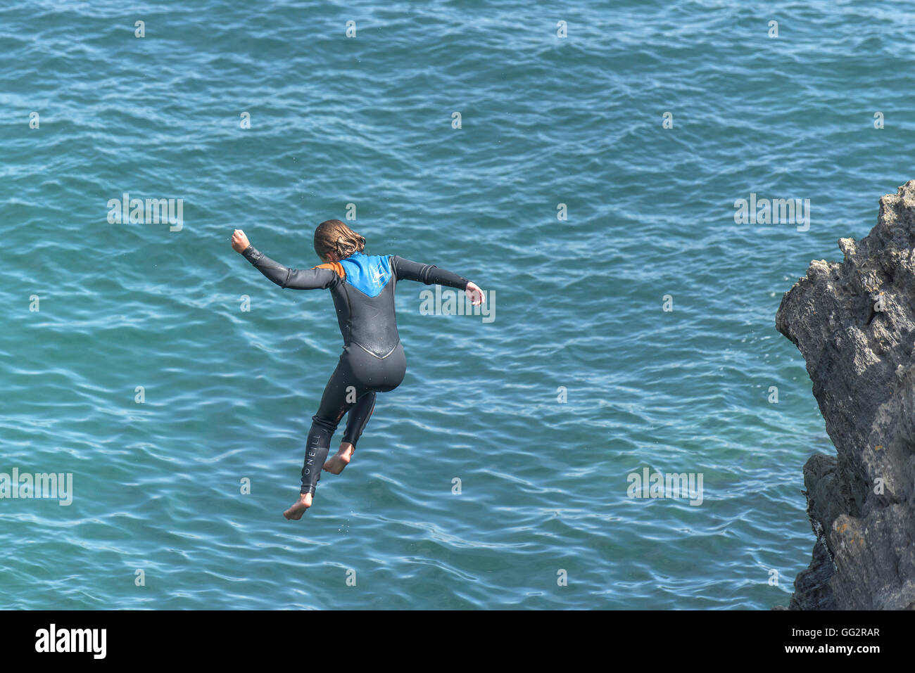 Young People Jumping Off Cliffs High Resolution Stock Photography and ...