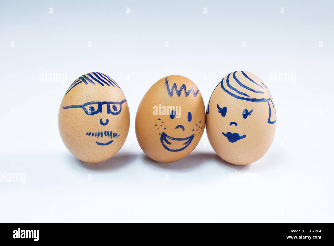 A happy, harmonious three member egg family Stock Photo - Alamy