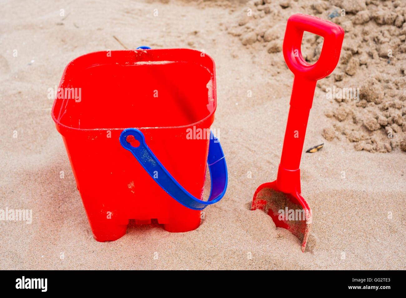 A bucket and spade on a beach in Haverigg, Cumbria Stock Photo - Alamy