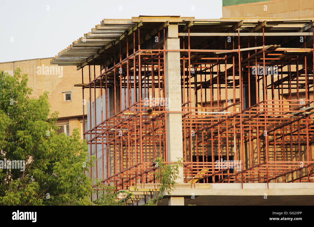 red metal structure in the form of frame on the construction site of ...