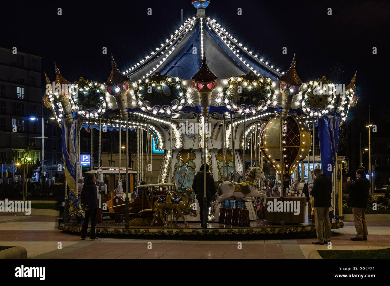 Carousel in motion at night in Castro Urdiales. Cantabria, Spain Stock ...