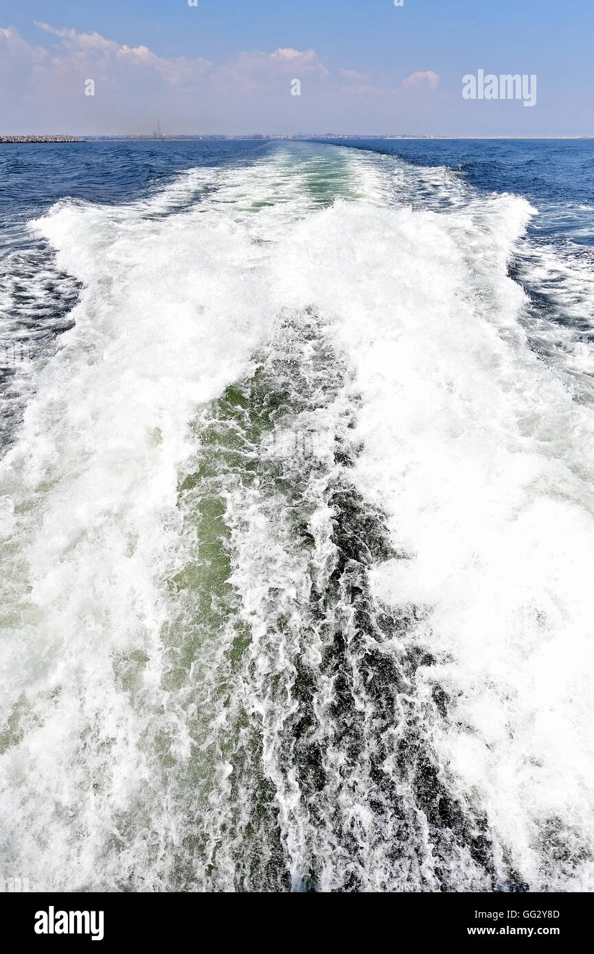 Big waves done by motorboat into the sea Stock Photo - Alamy