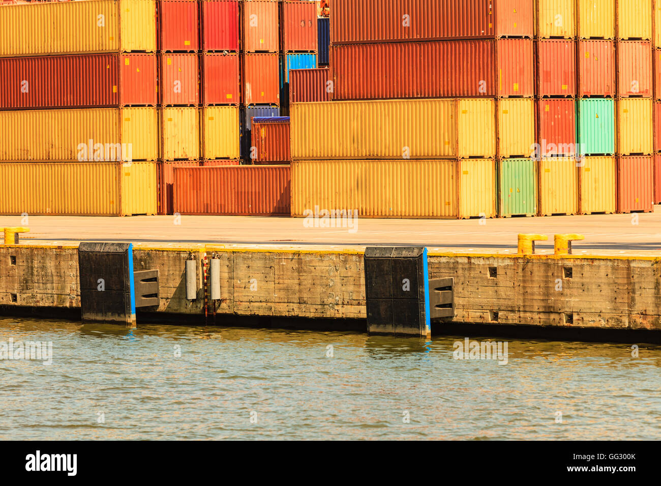 Various containers waiting in port. Cargo goods in harbour. Commerce ...