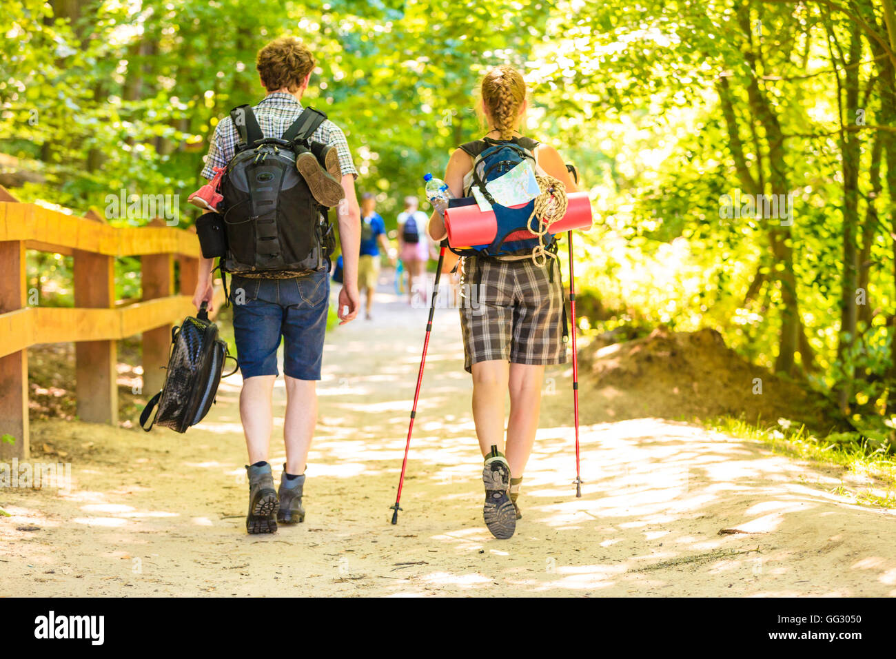 Adventure, tourism active lifestyle- young couple backpacker hiking in ...
