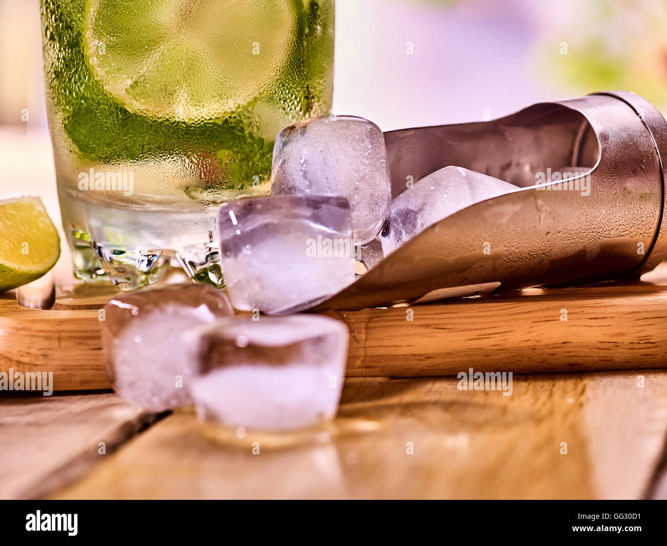 Chunks of ice cubes alcohol drink background on wooden boards Stock ...