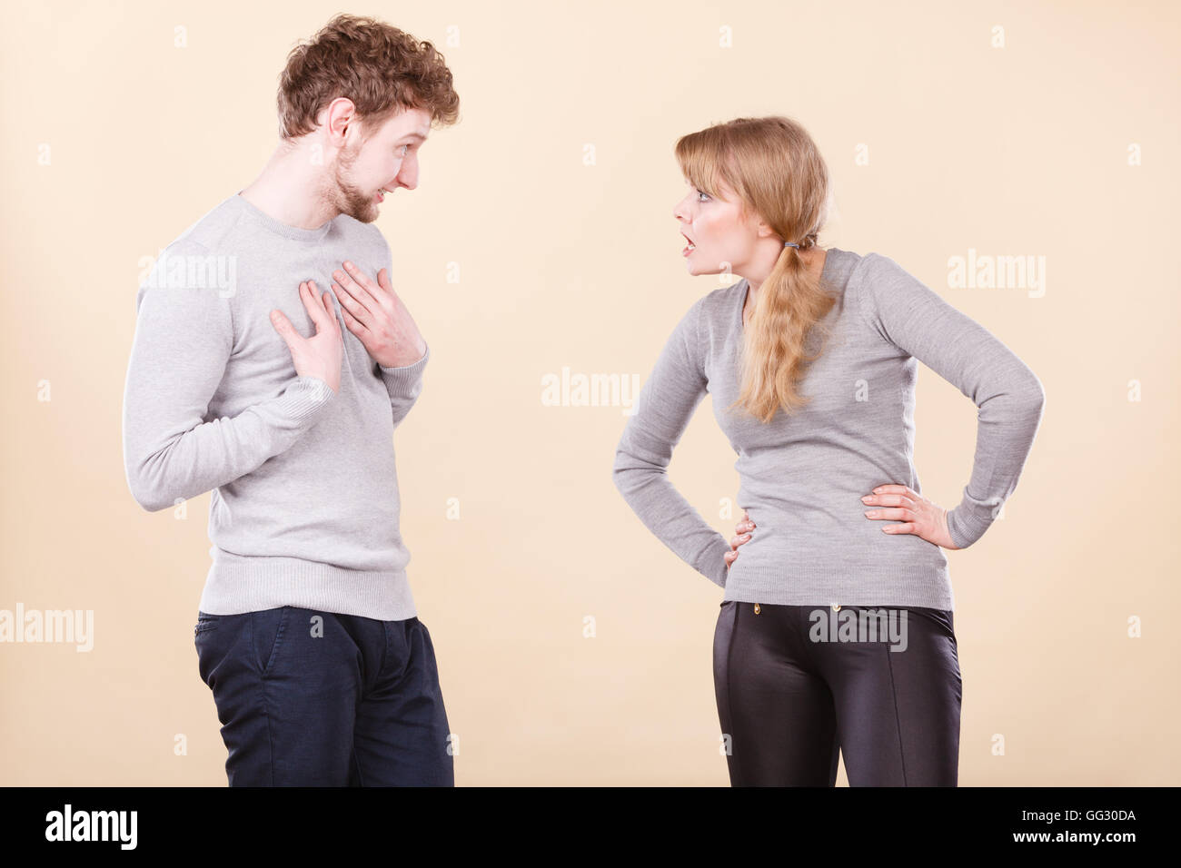 Problems in relationship. Young blonde couple arguing and yelling on ...