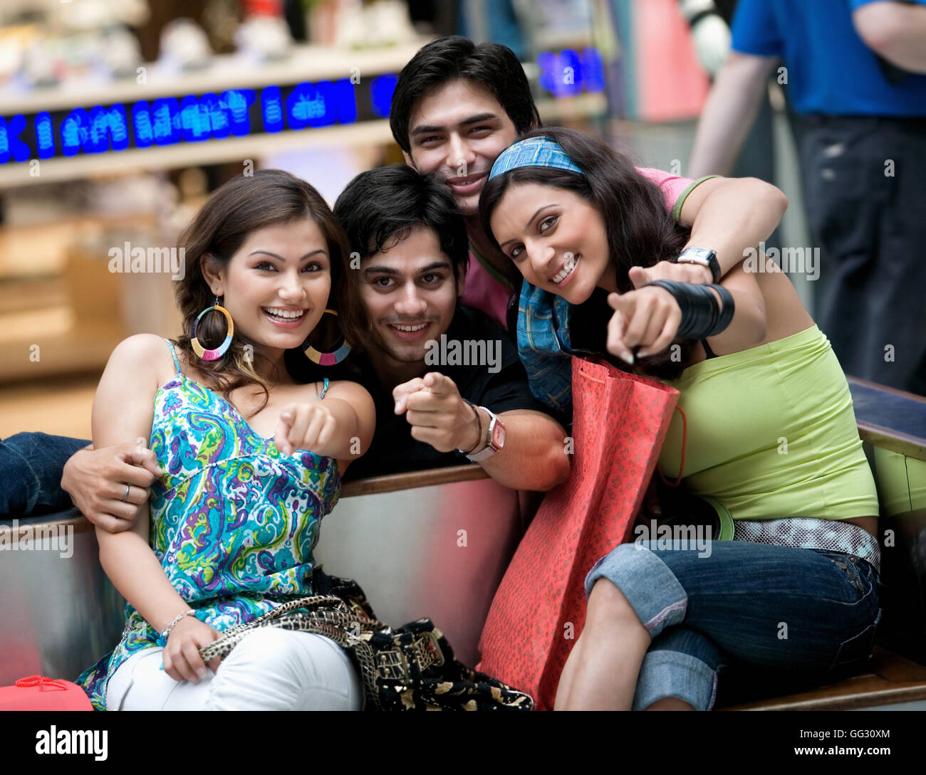 Male friends enjoying at mall hi-res stock photography and images - Alamy