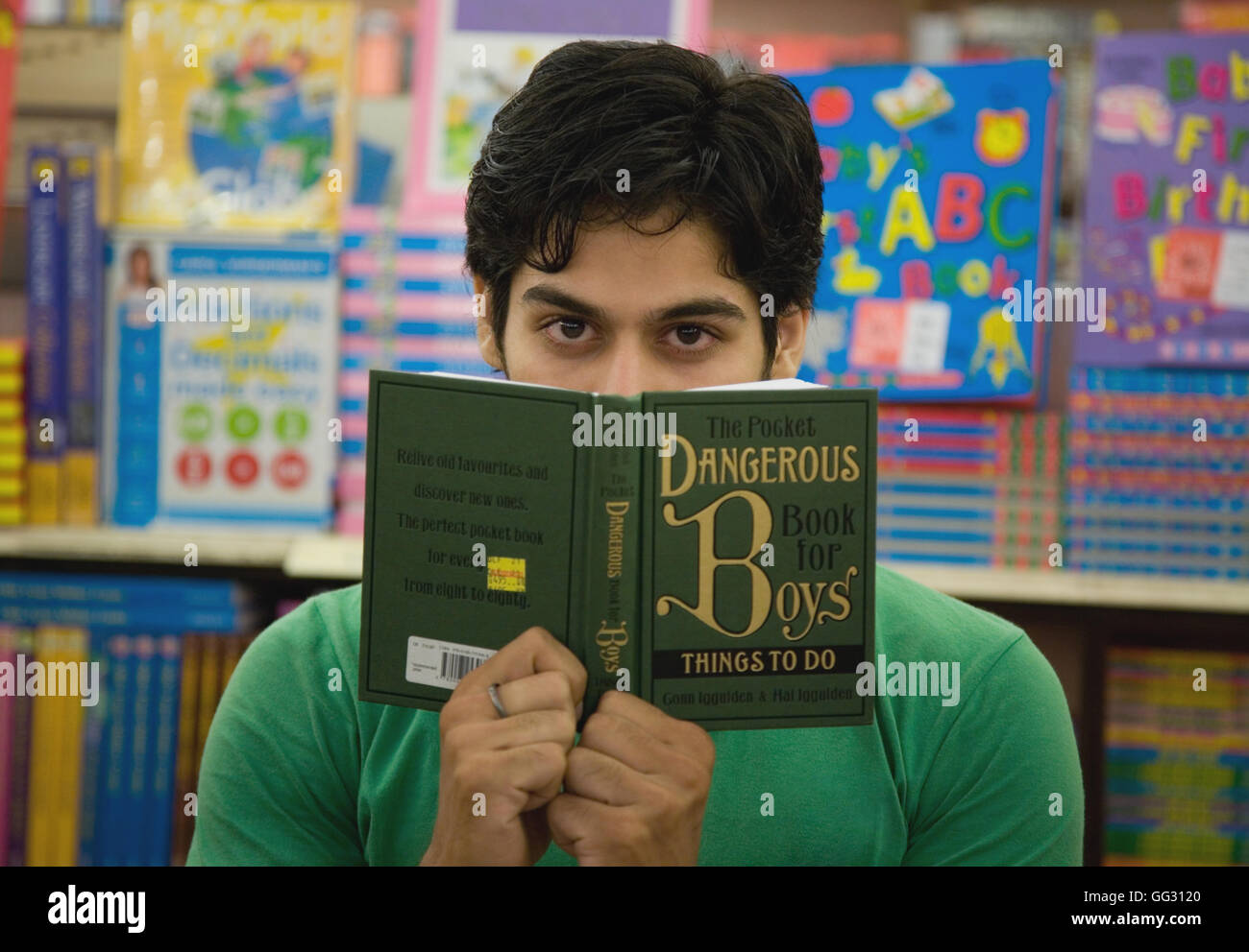 Man reading a book Stock Photo - Alamy