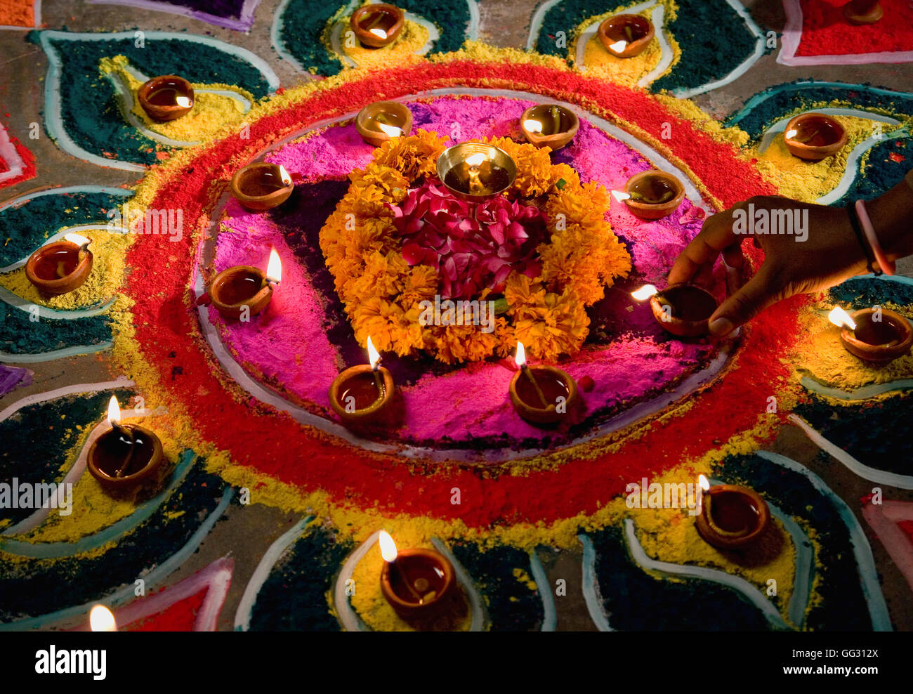 Diya with Rangoli Stock Photo - Alamy