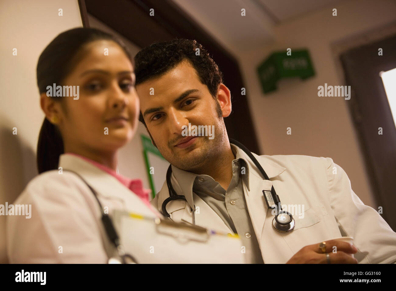 Doctor flirting female hi-res stock photography and images - Alamy