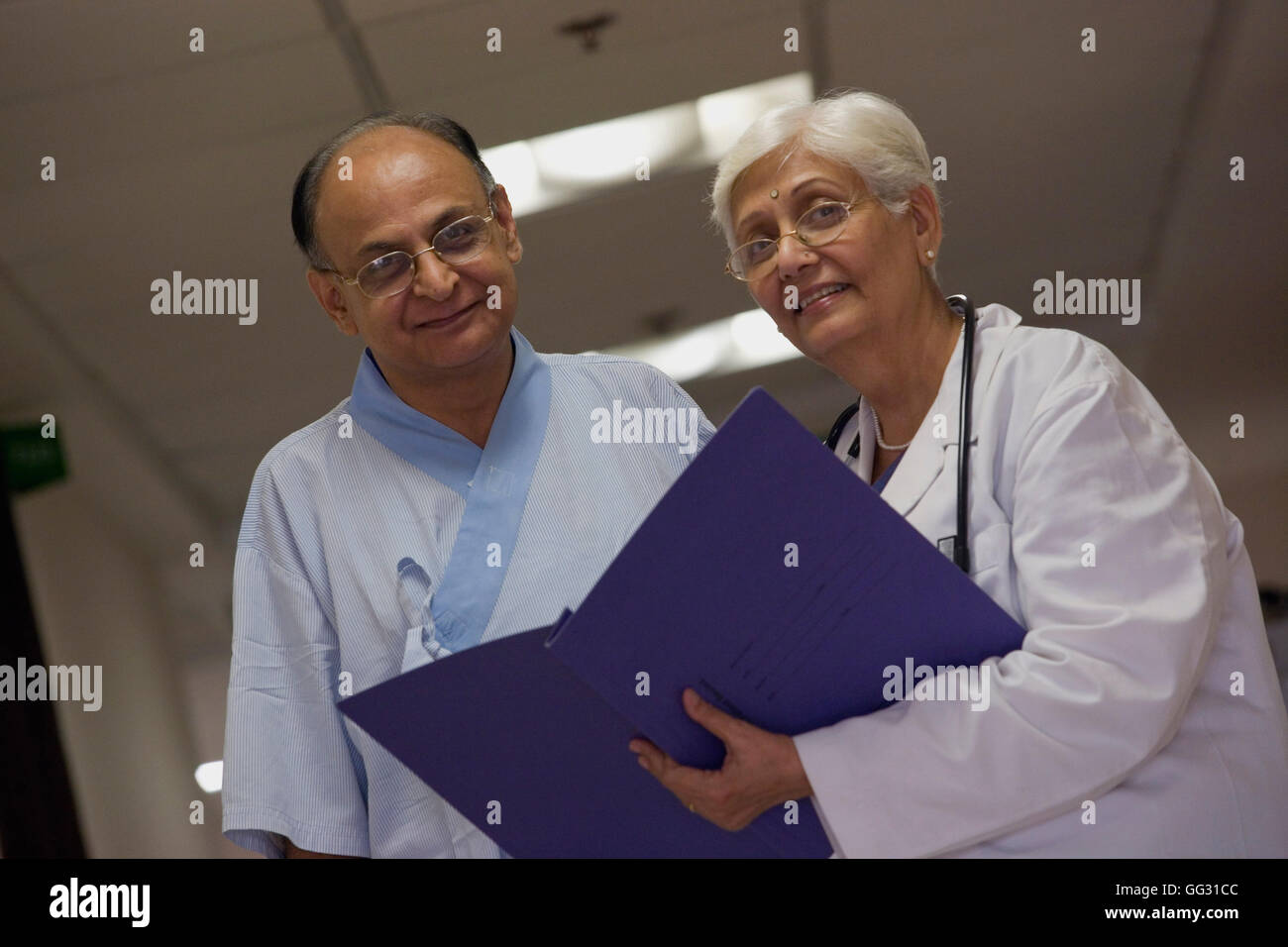 Doctor assessing patient hi-res stock photography and images - Alamy