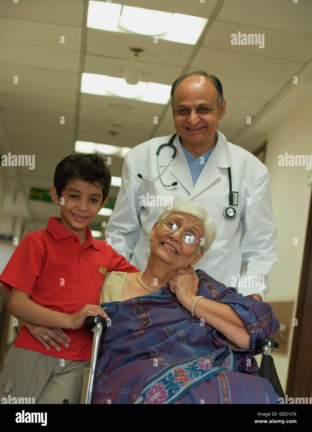 A doctor and a family Stock Photo - Alamy