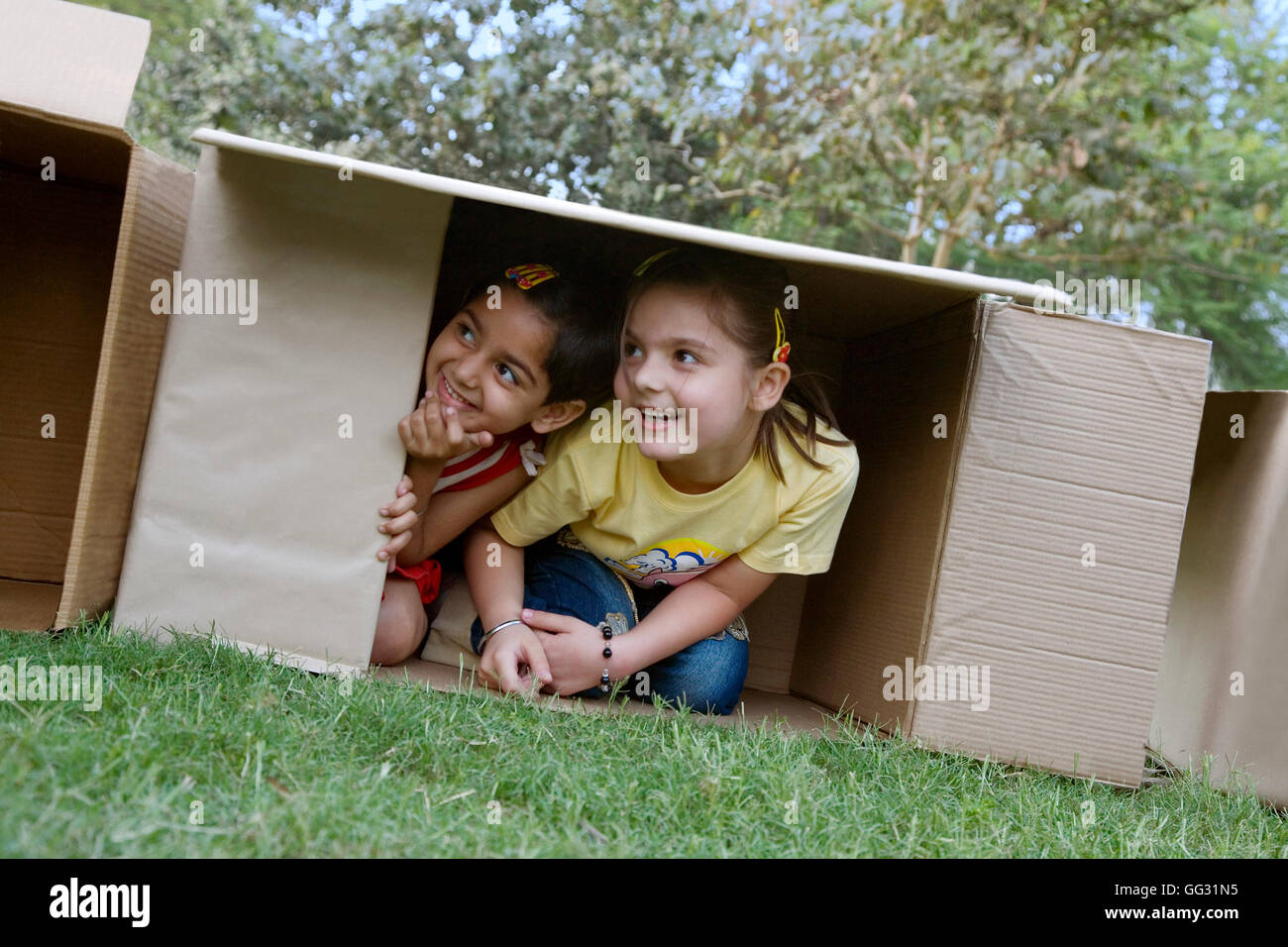 Children inside a box Stock Photo - Alamy
