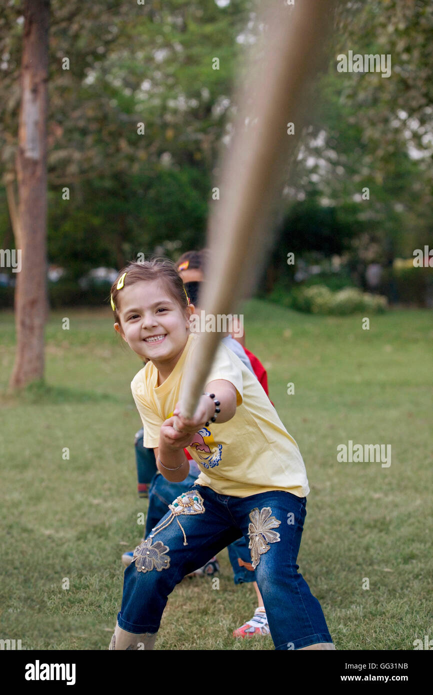 Children pulling a rope Stock Photo - Alamy