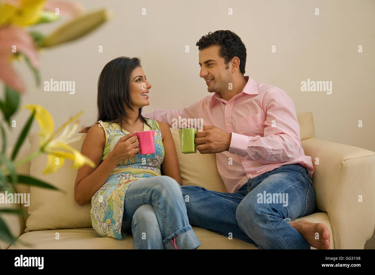 Couple having tea together Stock Photo - Alamy