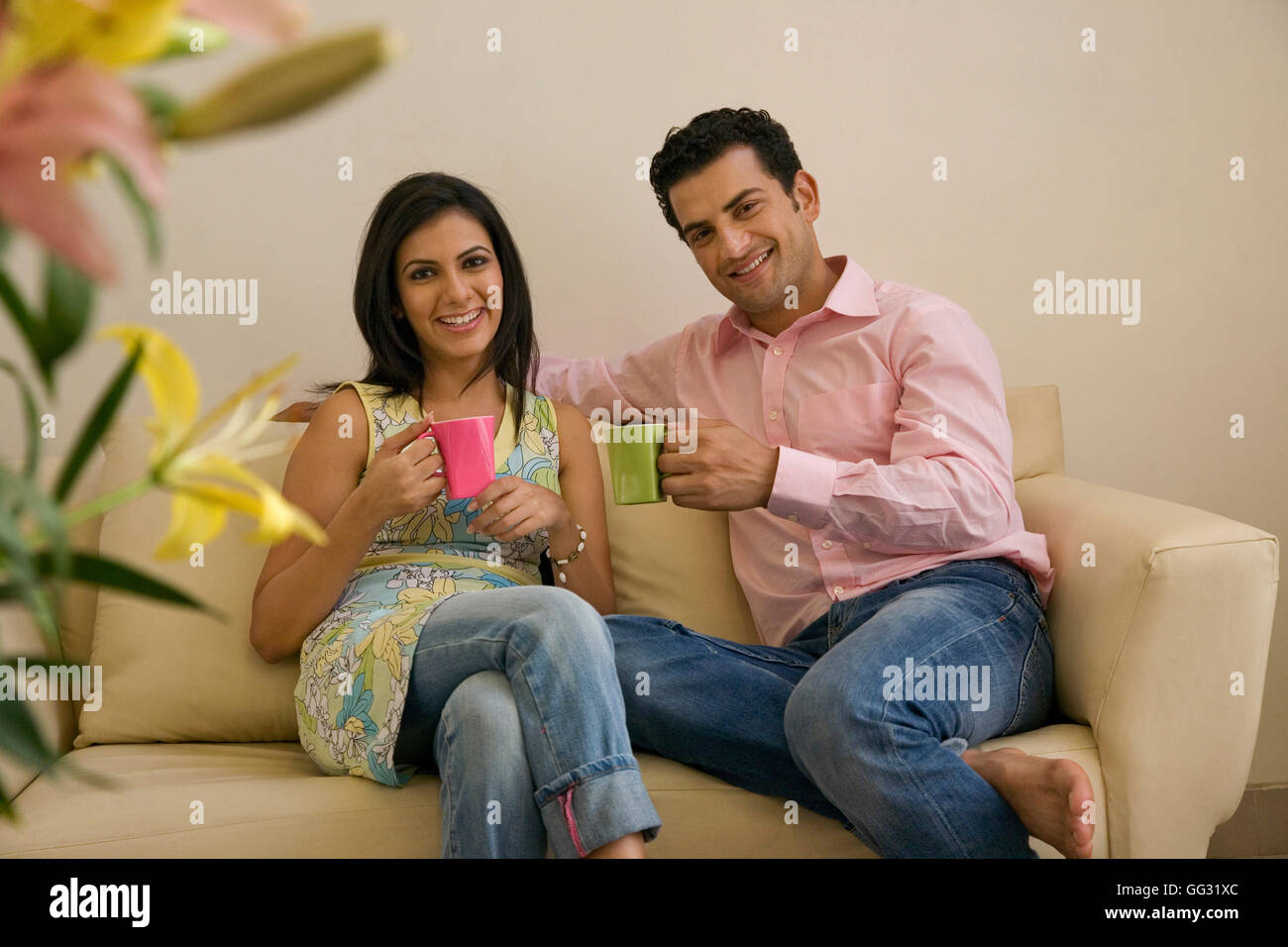 Couple having tea together Stock Photo - Alamy