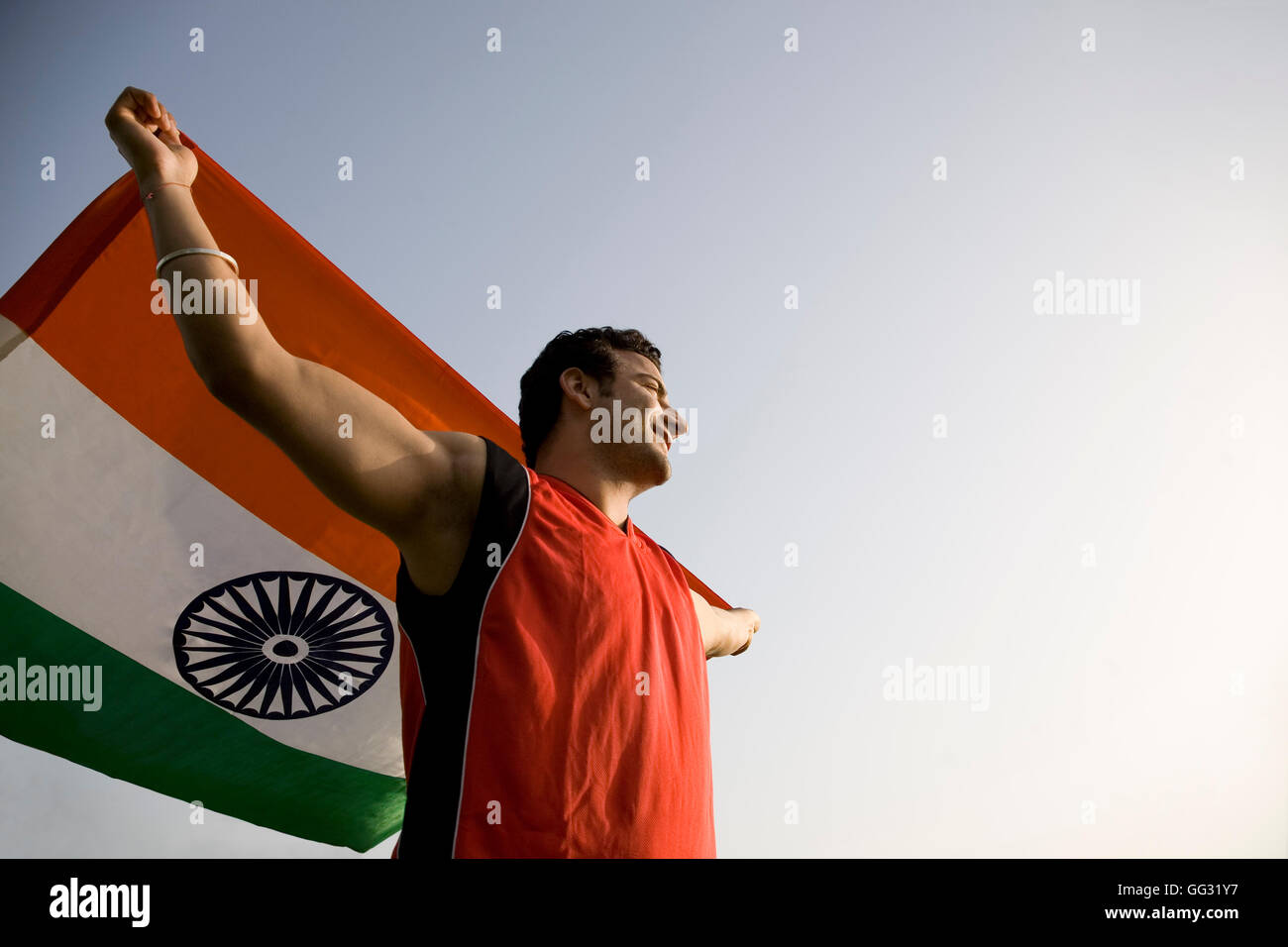 Holding the national flag hi-res stock photography and images - Alamy