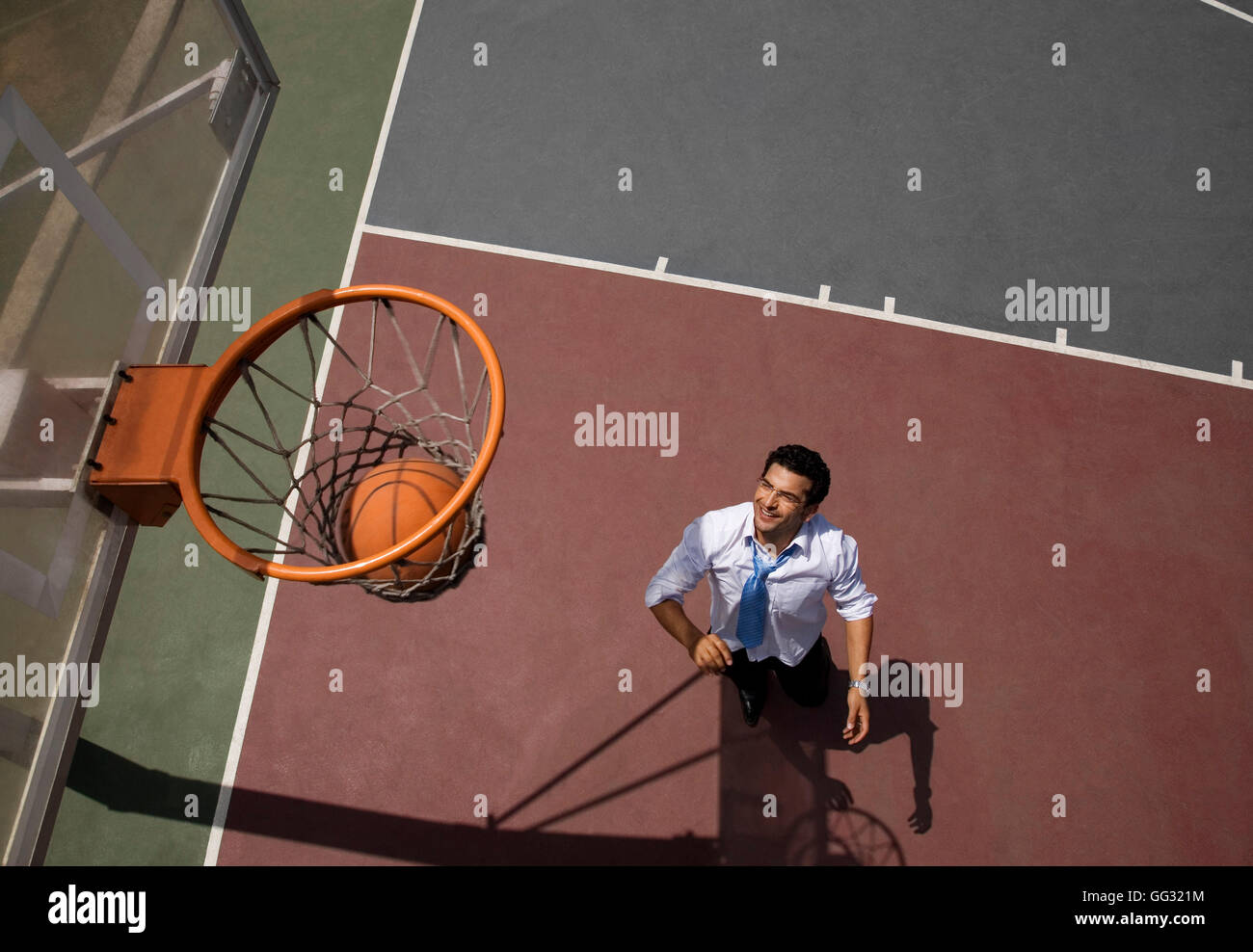 Indian man playing basketball hi-res stock photography and images - Alamy