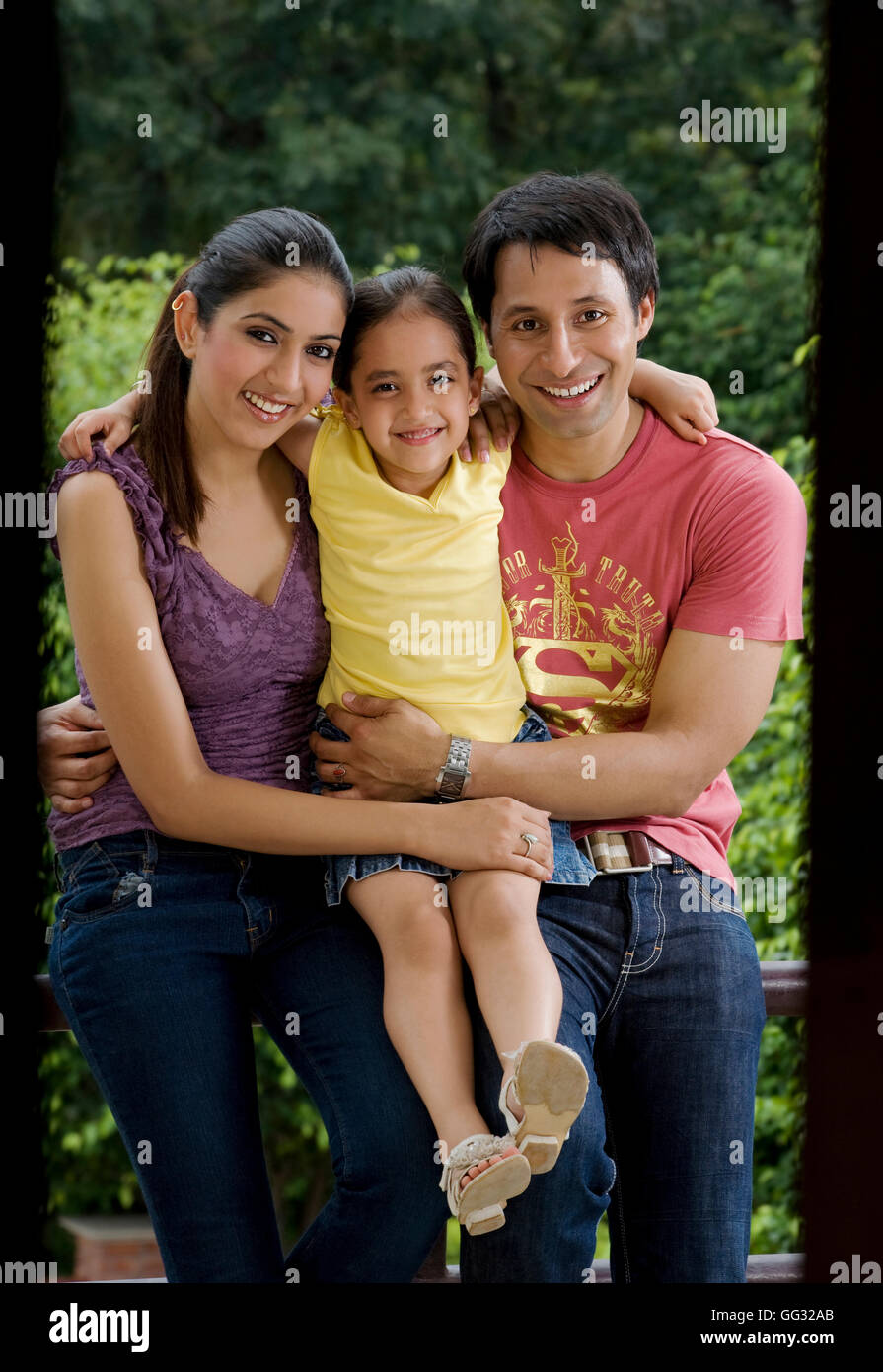 Girl with her parents Stock Photo - Alamy