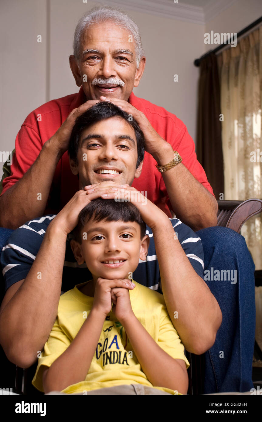 Three generations of a family Stock Photo - Alamy