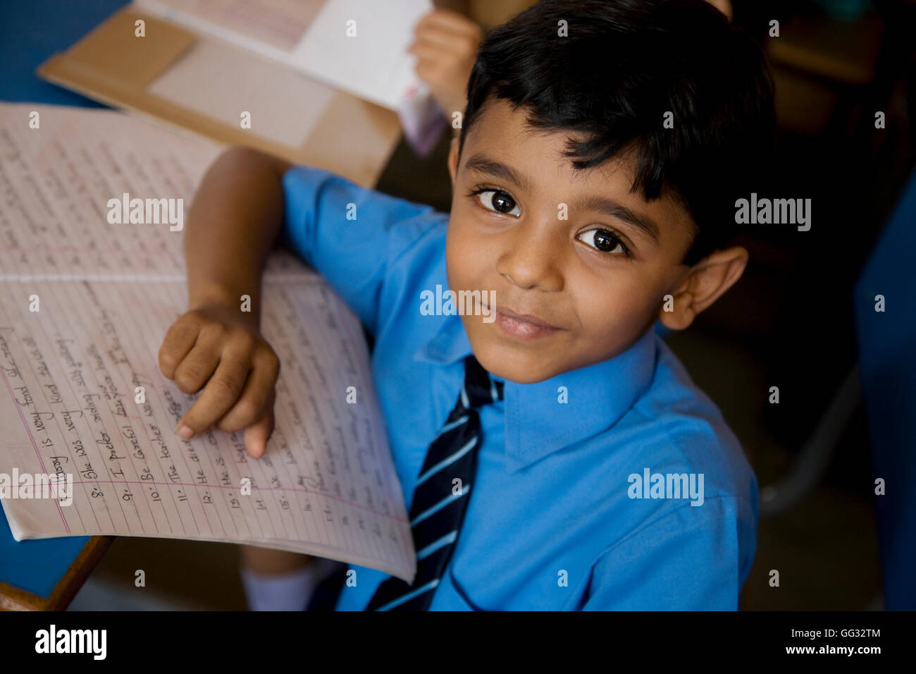 School boy with his notebook Stock Photo - Alamy