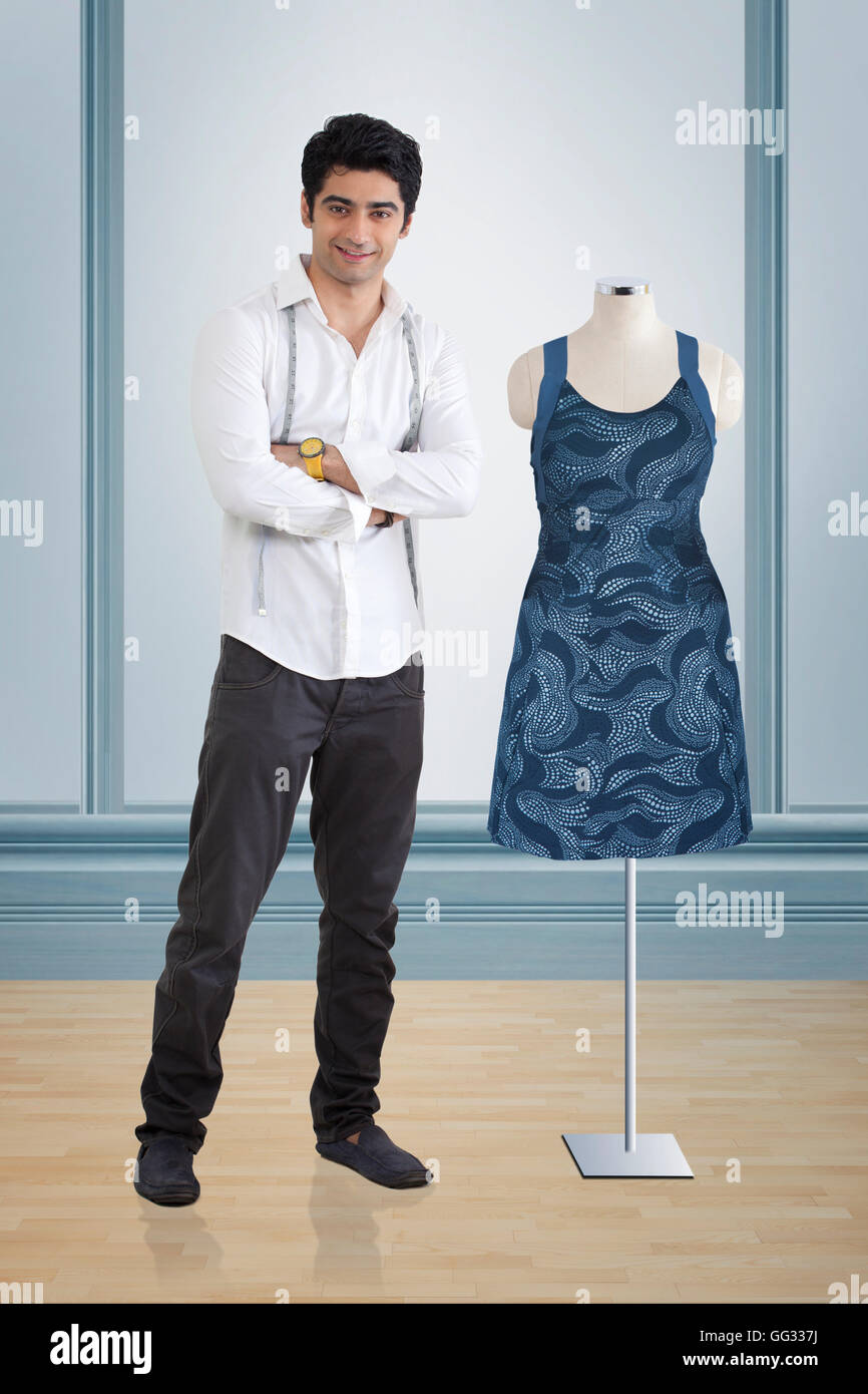 Young indian male fashion designer hi-res stock photography and images ...