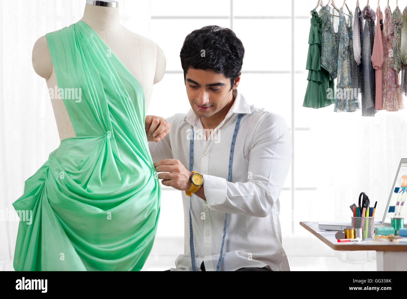 Male fashion designer adjusting hi-res stock photography and images - Alamy
